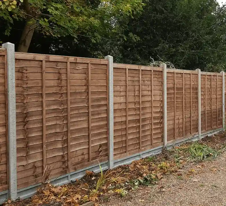 How to install Lap Fence Panels in your Garden - Clarke Fencing